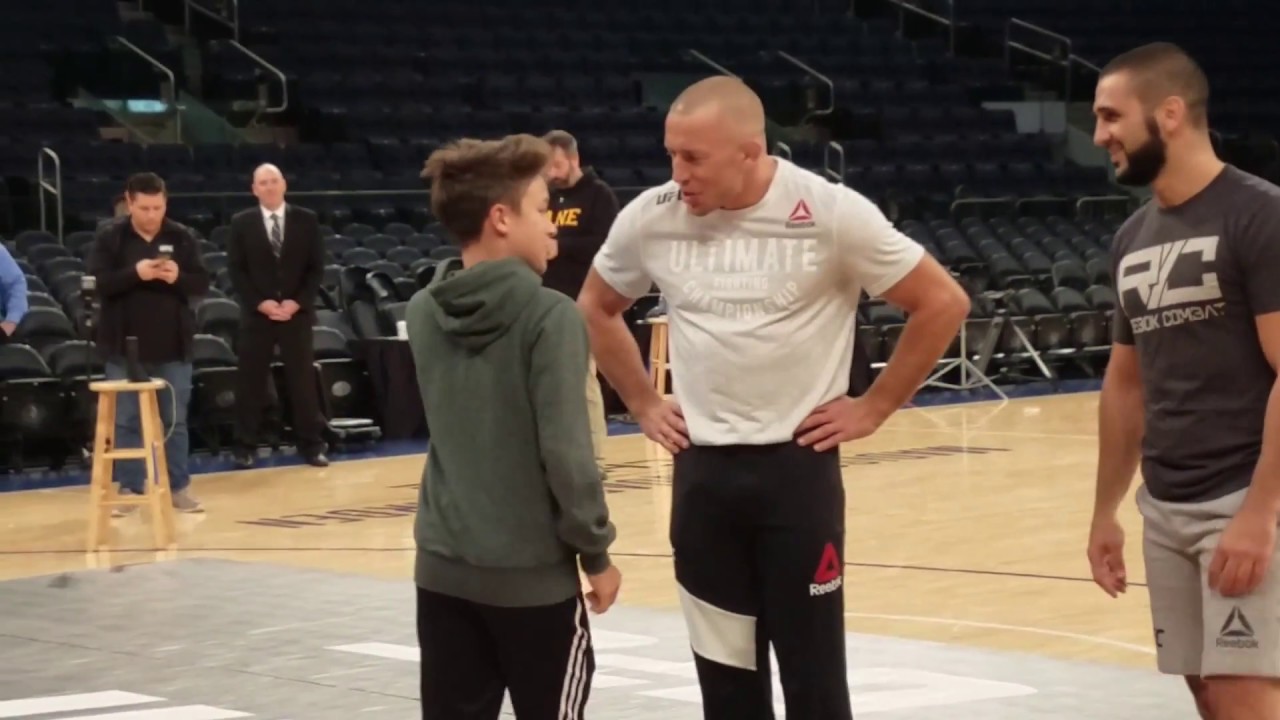 Georges St-Pierre wrestles with kid at his open work out ahead of UFC ...