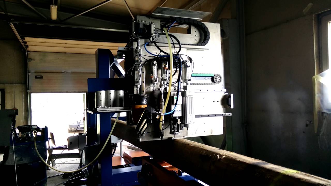 Automatic machine for marking utility posts - YouTube