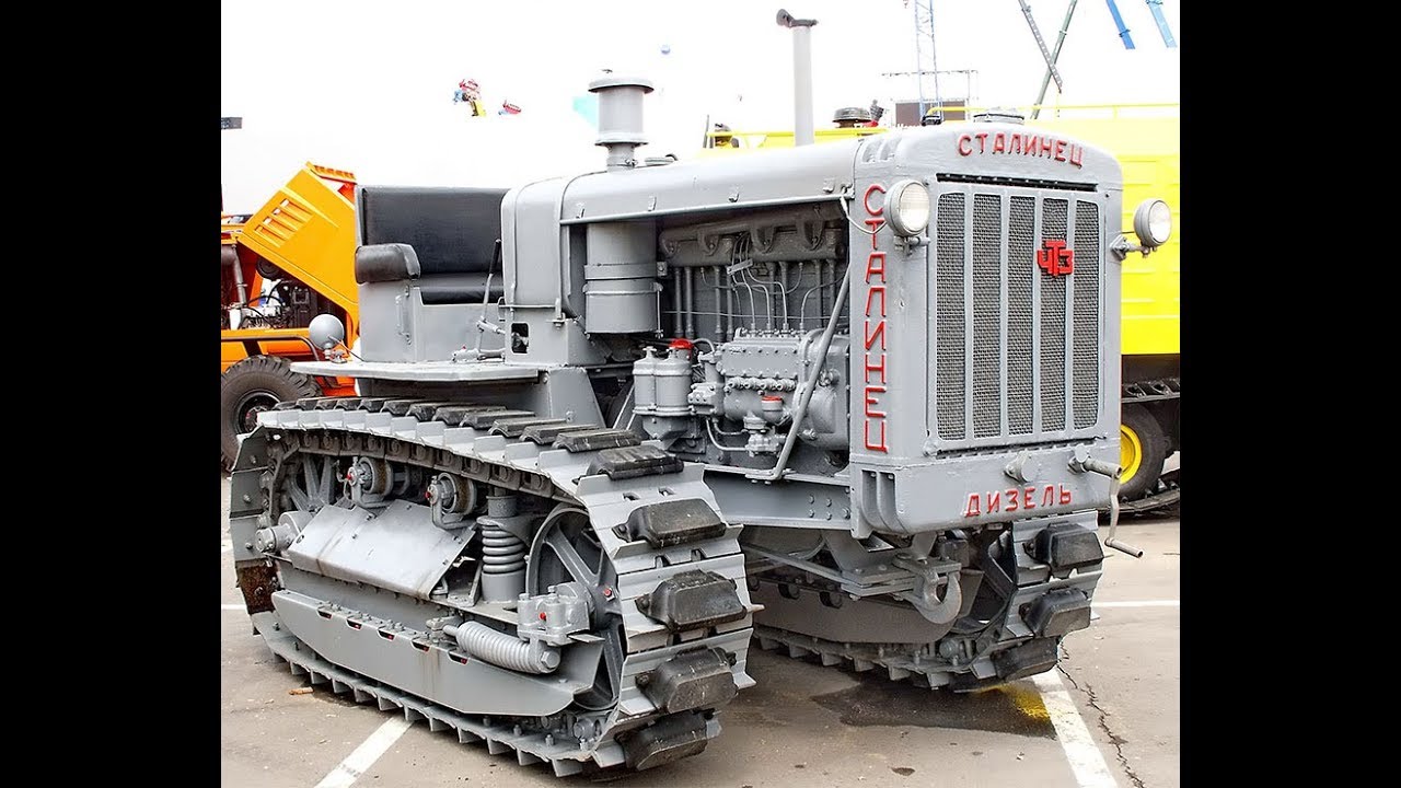 In the swamps of Russia were found old tractor "STALINIST",It is lifted ...