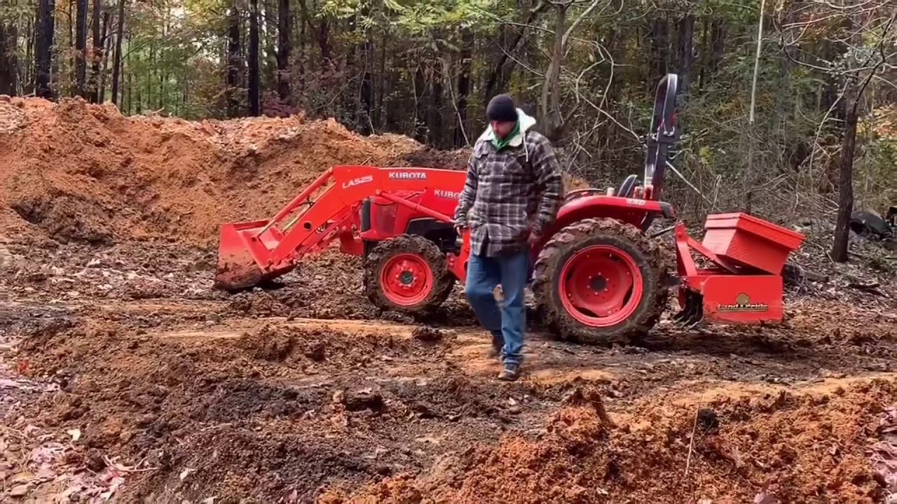 Building small dam for pond with kubota compact tractor L2501 part 1 ...