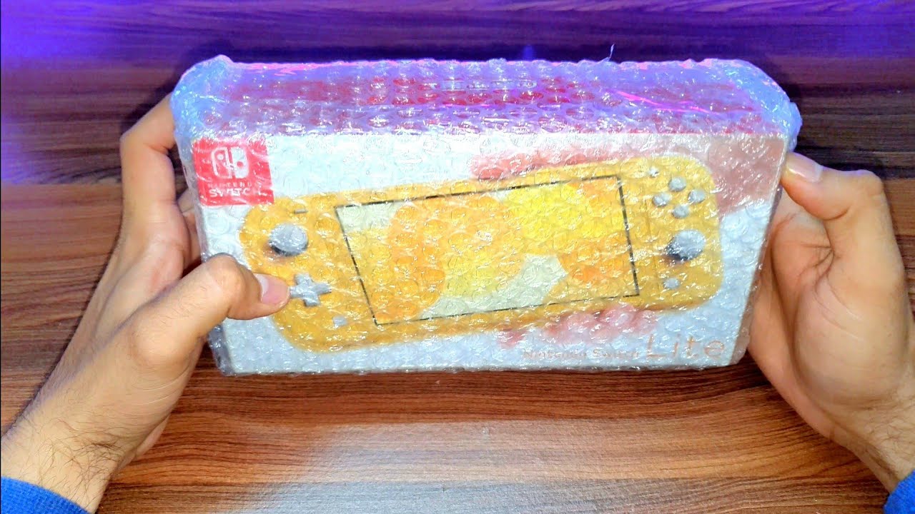 Nintendo Switch Lite Unboxing in 2022 (Impression and Quick Setup ...