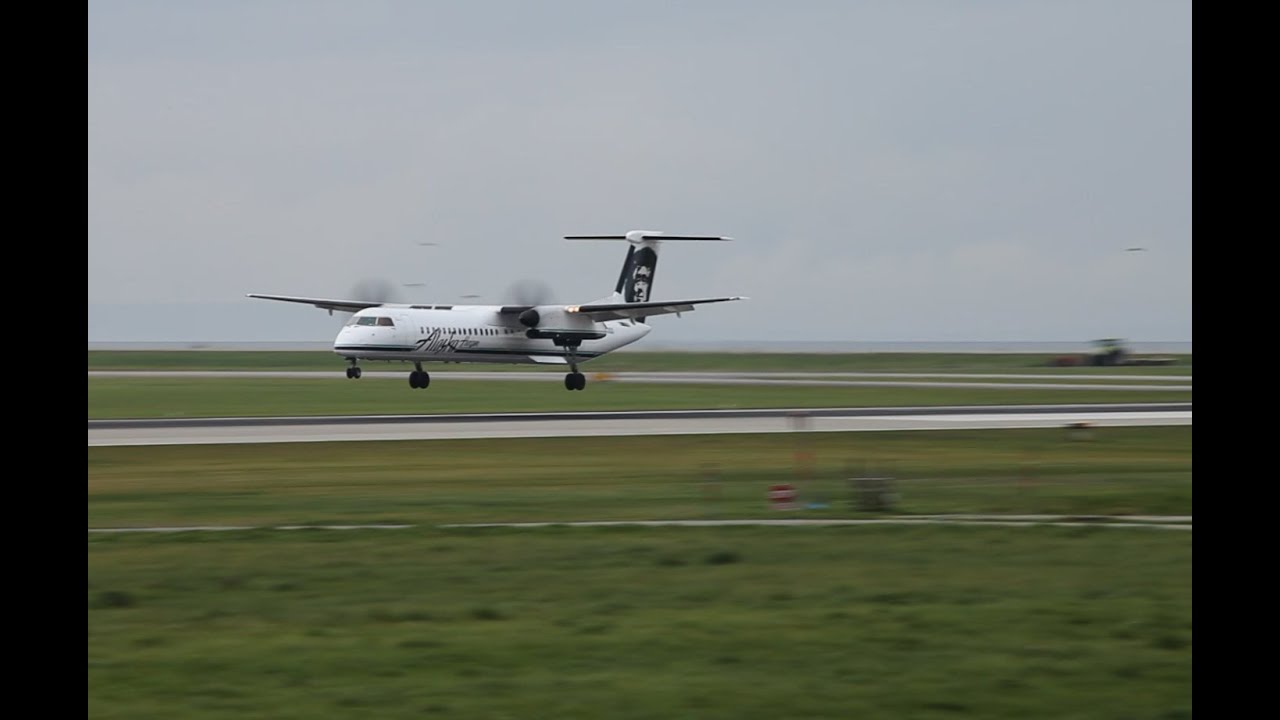 Quick Clip-Horizon Air Q400 landing at YVR - YouTube