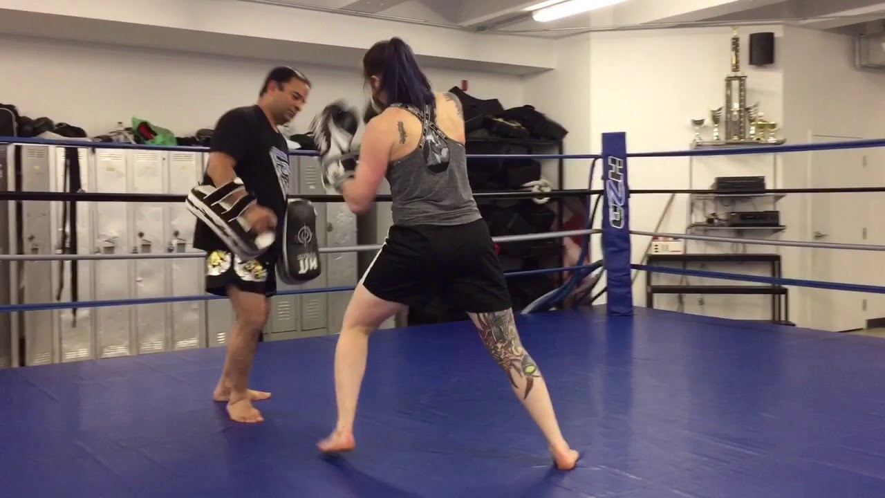 Alexis hitting Muay Thai boxing pads - YouTube