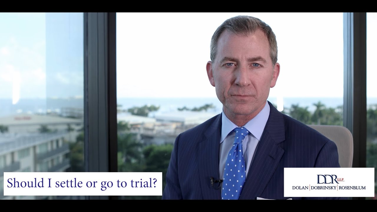 Should I Settle or Go to Trial? | Q&A with Attorney Dan Dolan - YouTube