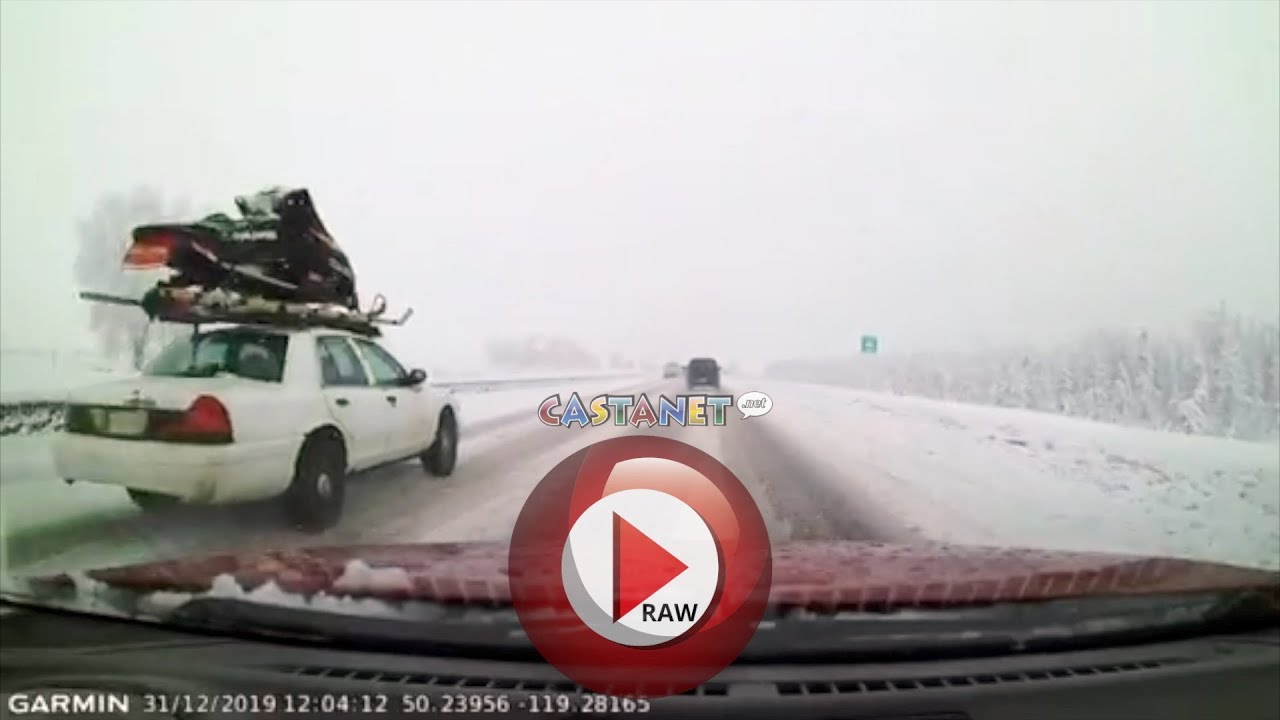 Raw: Snowmobile on top of sedan - YouTube