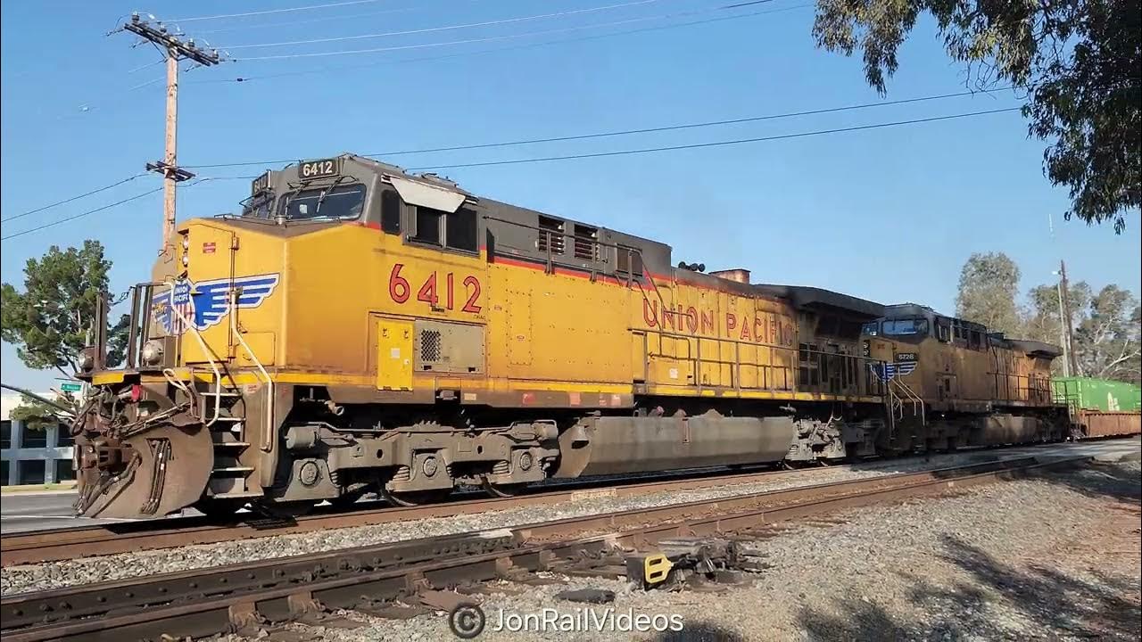 7/7/24 Pre: UP ZG2LC passes Archibald crossing in East Ontario, CA-2 ft. UP 6412 lights left on ...