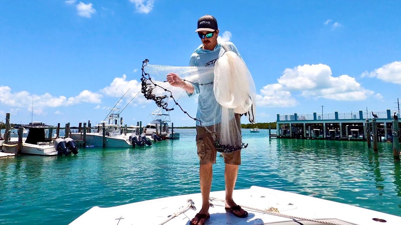 HOW TO throw a CAST NET! Netting lots of bait fish! - YouTube