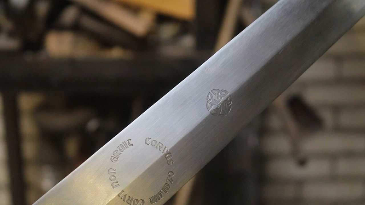 Heat treating and electric etching a sword. - YouTube