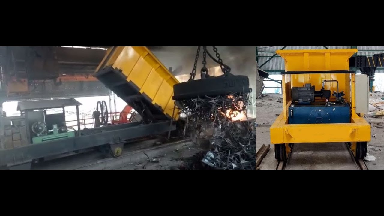 Scrap Feeding Trolley Charging into Induction Furnace - YouTube