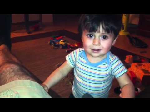 Baby smelling daddy's feet