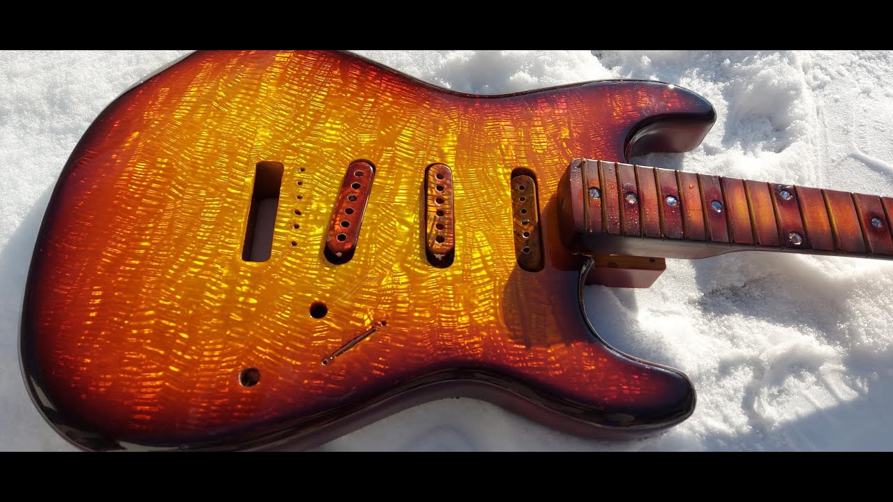 What a BURST....Vintage style Pearlvibe strat with real white abalone ...