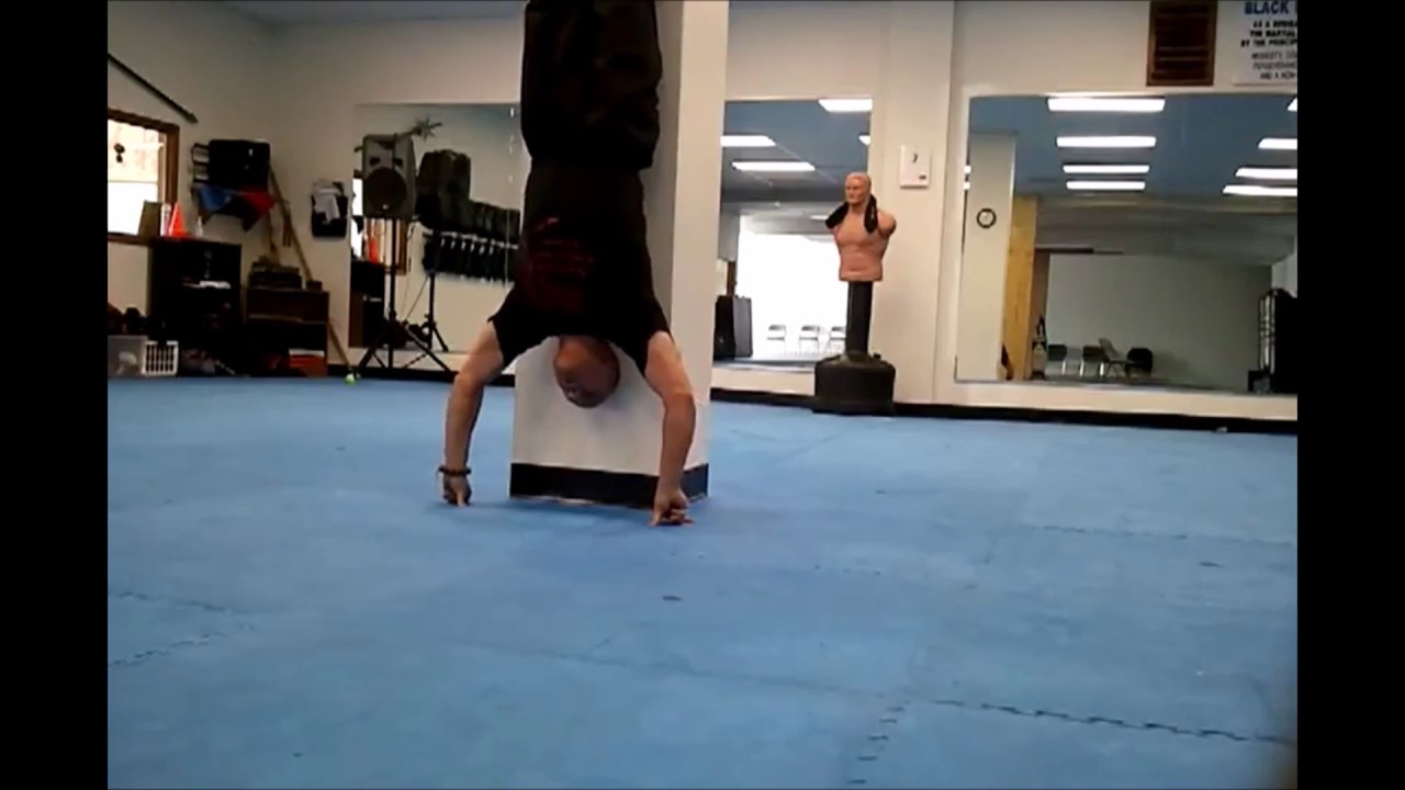 Two finger handstand push ups - YouTube