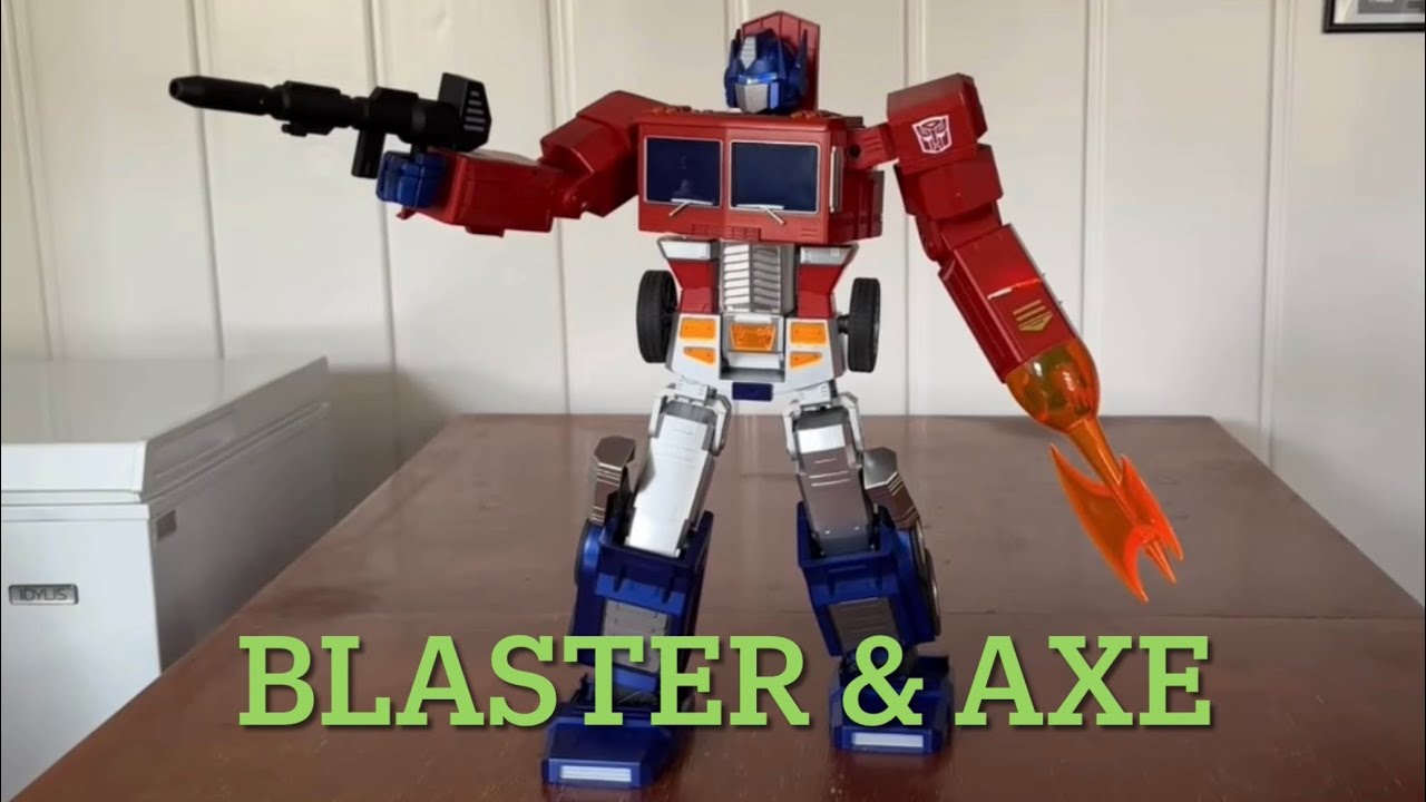 Robosen Transformers Optimus Prime Using Blaster Gun & Energon Axe ...