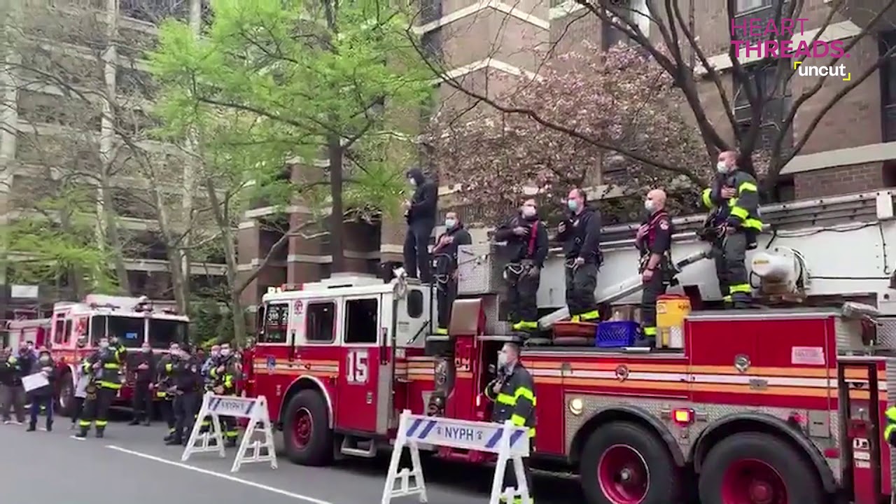Firefighters salute medical workers with national anthem - YouTube