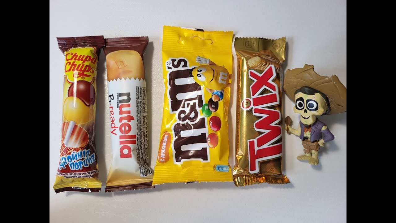 Unpacking lollipops! Twix and M&Ms! with a surprise - YouTube