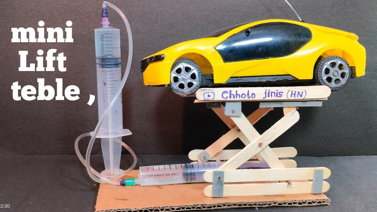 How to make hydraulic Lift table at home. using syringe and sticks ...