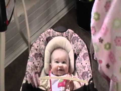 Baby girl blowing fart bubbles at her daddy