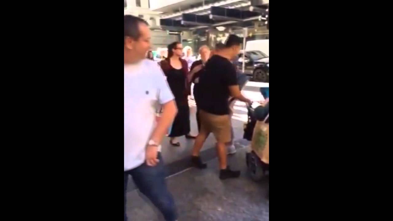 Crazy woman freaks out at citizens - YouTube