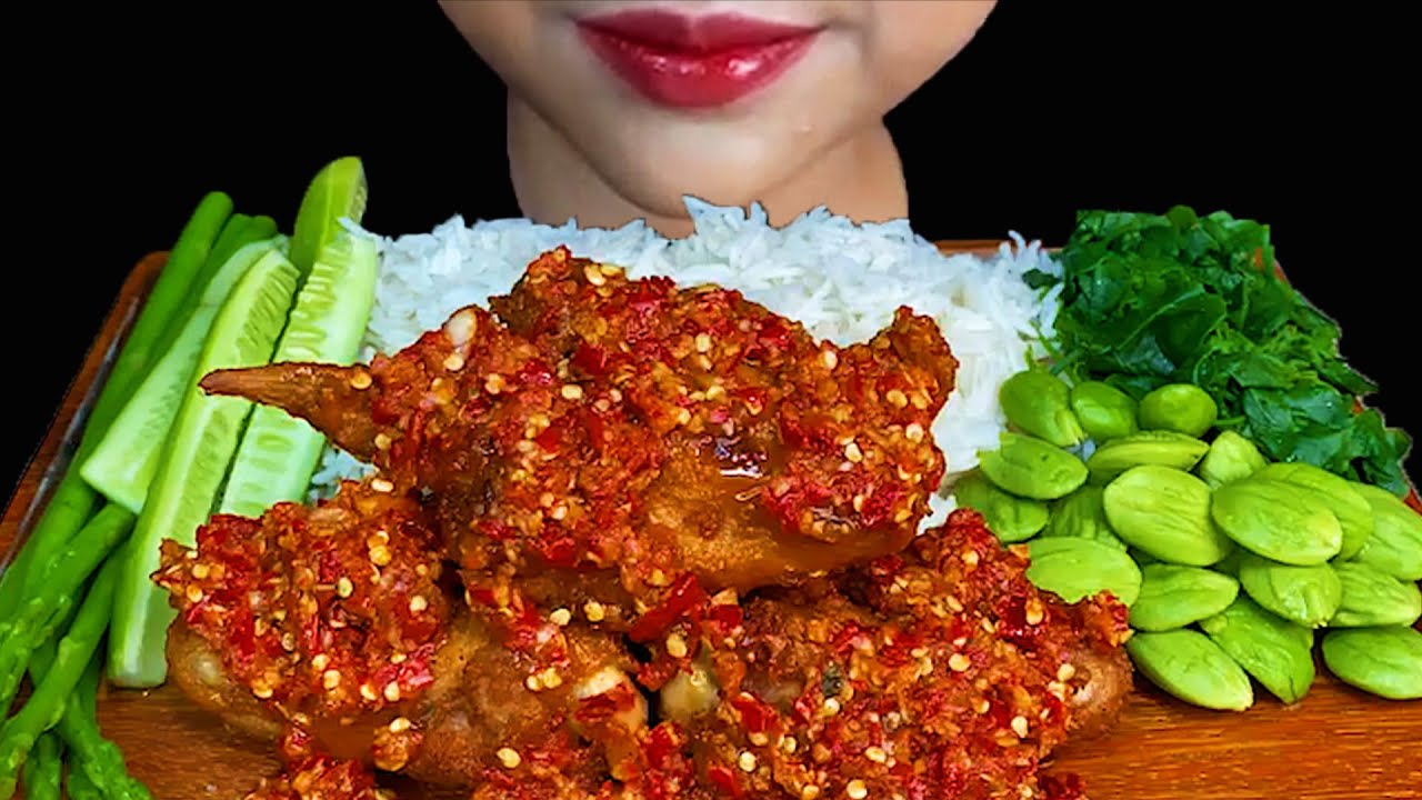Eating Spicy Food Fried Chicken Spicy Chilli Sauce Fresh Vegetables eating-spicy-food-fried-chicken-spicy-chilli-sauce-fresh-vegetables