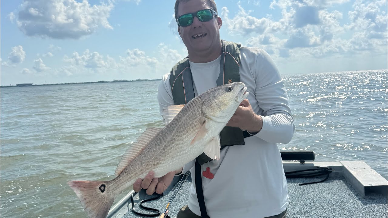 Lake Pontchartrain is producing! Redfish and speckled trout! - YouTube