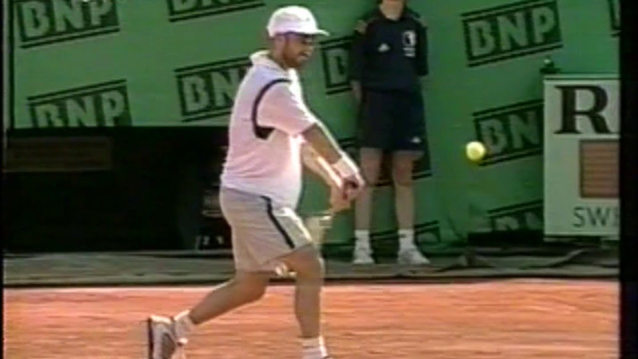 ANDRE AGASSI BACKHAND SLOW MOTION - YouTube