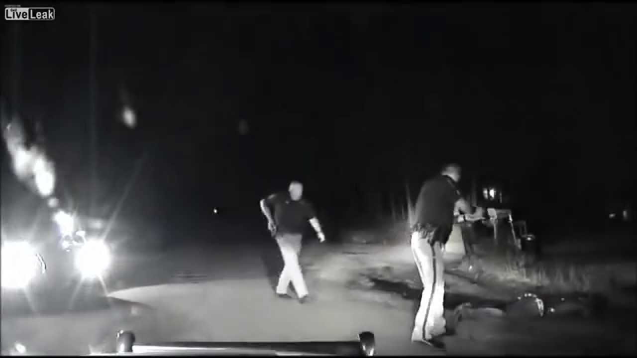 Man from Planet Zoltron Jumps on Police Cruiser Breaks Windshield - YouTube