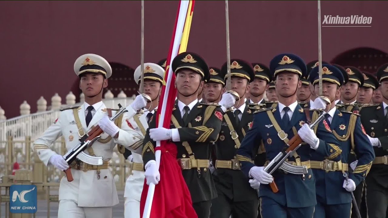 National flag-raising ceremony held at Tian'anmen Square in Beijing ...