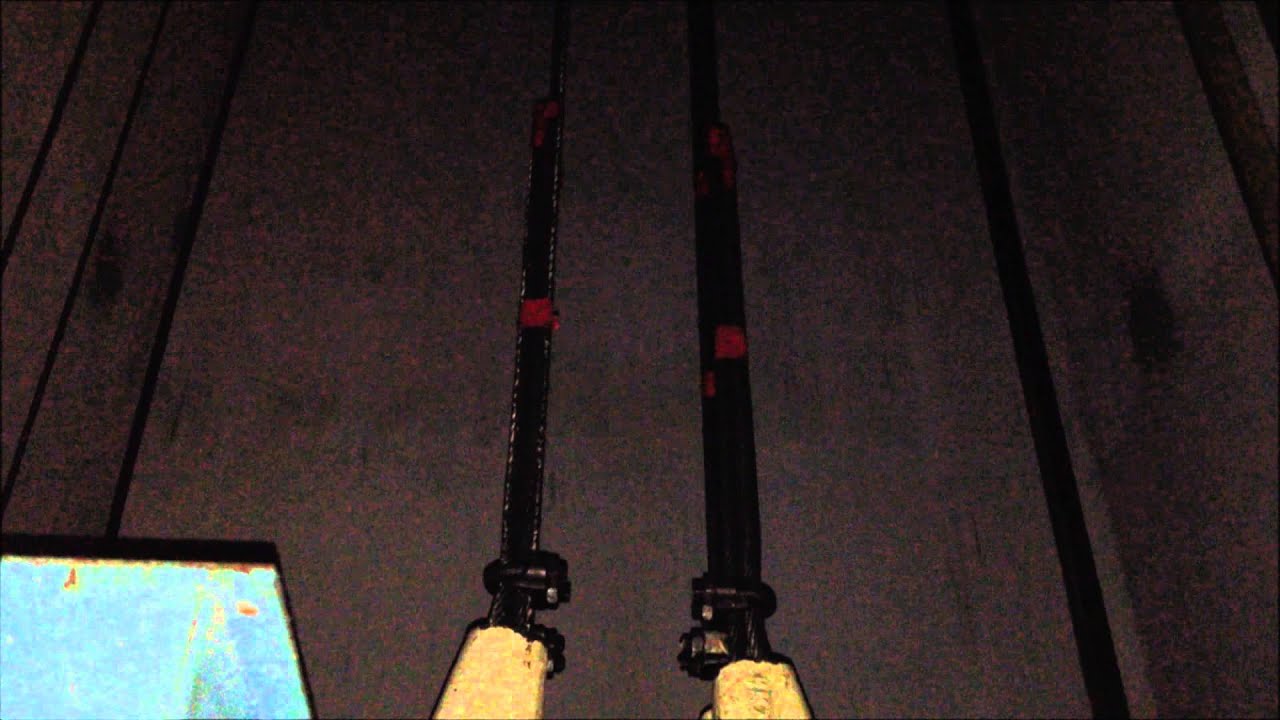 A camera surfing on manual door lift/elevator shaft - YouTube