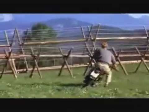 Steve McQueen The Great Escape motorcycle jump with happy ending - YouTube