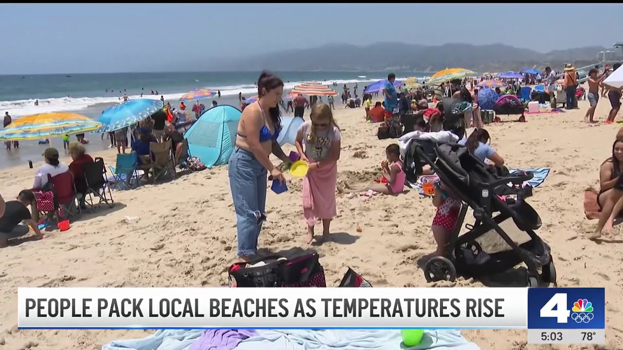People pack Southern California beaches as temperatures rise - YouTube