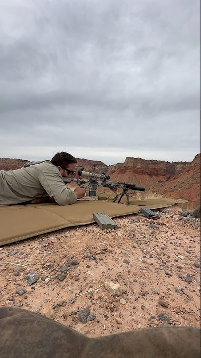 Working on transitioning between targets while prone. 12” gongs at about 300 meters. - YouTube