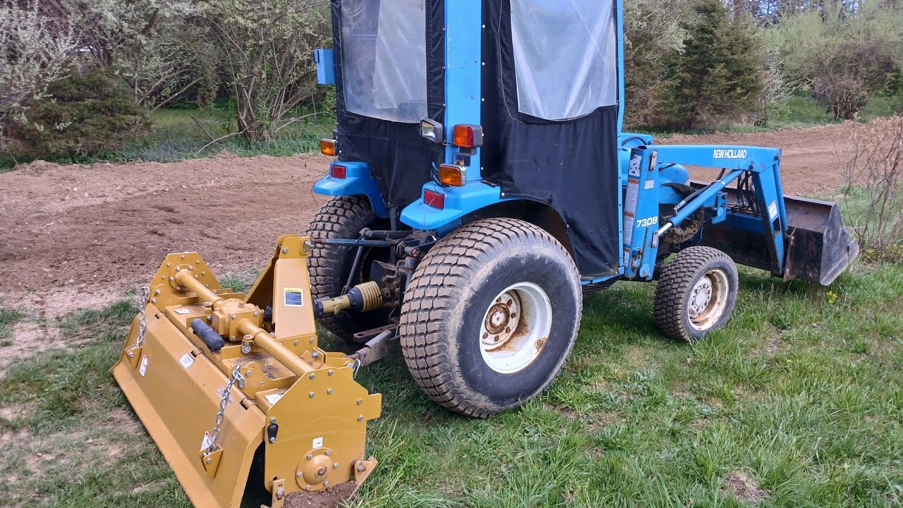 County line rototiller on New Holland TC33D - YouTube