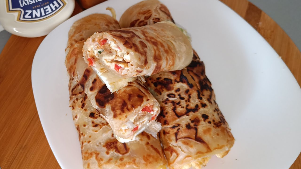 Cooking Most Delicious Ugandan Rolex😋||chapati omelette!||chapati mayai ...