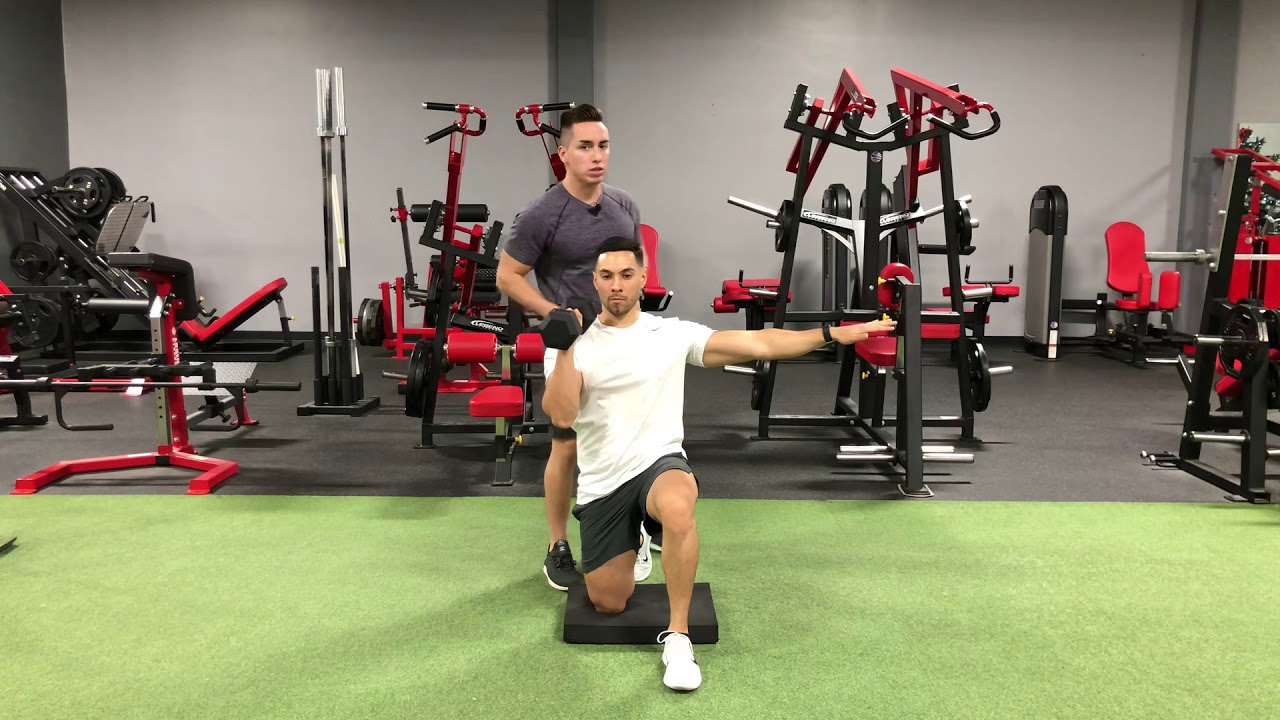 HOW TO: Kneeling Single Arm Dumbbell Overhead Press - YouTube