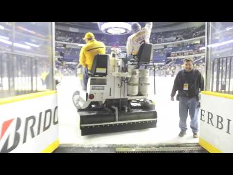 Predators fan rides Zamboni between game period - YouTube