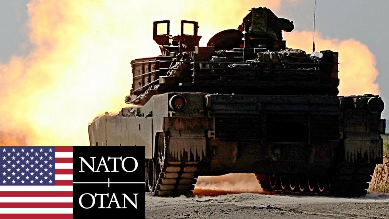 US Army, NATO. Tanks, armored vehicles and soldiers. Combat exercises ...