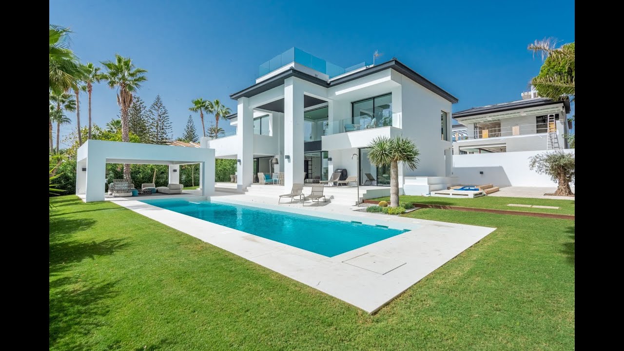 Luxury Villa Steps From The Beach in New Golden Mile - YouTube