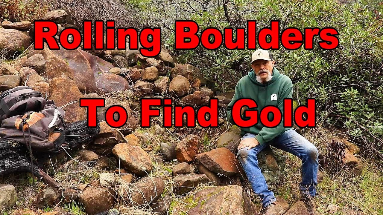 Moving large boulders on the hillside in a race with the rain to find ...