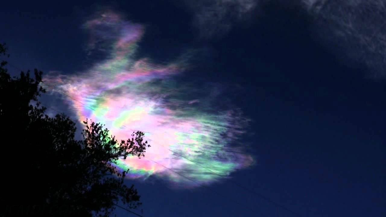 Amazing rainbow-colored iridescent cirrus cloud timelapse (high ...