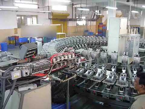 80 station rotary machine for PU soles by PU MIX Technologies - YouTube