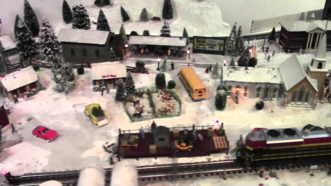 Model trains inside the KCS Holiday Express - YouTube