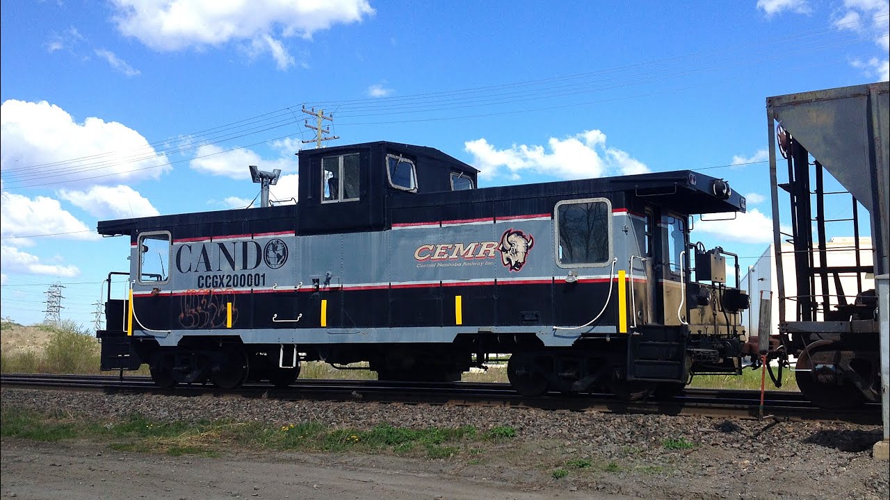 CABOOSE! CEMR 4002 Leads Ex-IC Ballast Hoppers East Through Winnipeg - YouTube