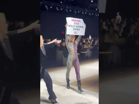 A PETA supporter dripping in blood infiltrated the Giorgio Armani fashion show on Madison Ave...