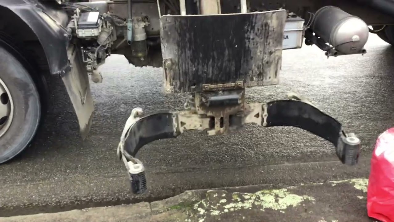 This is how a garbage truck arm works - YouTube