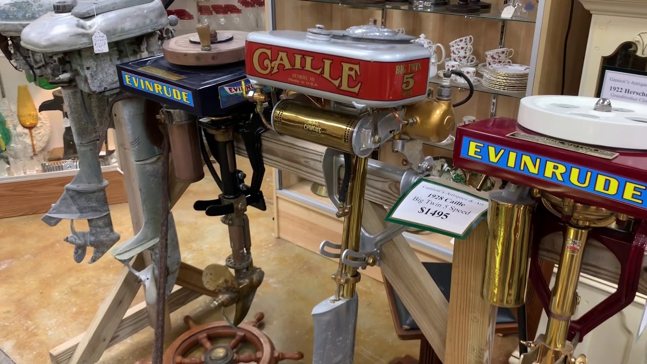Restored antique marine outboards at Gannons Antiques - YouTube