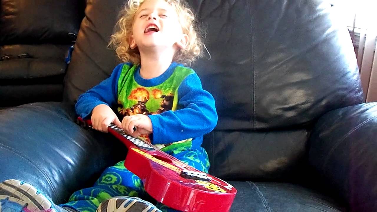Brandon Rockin' his Lightning McQueen Guitar - YouTube