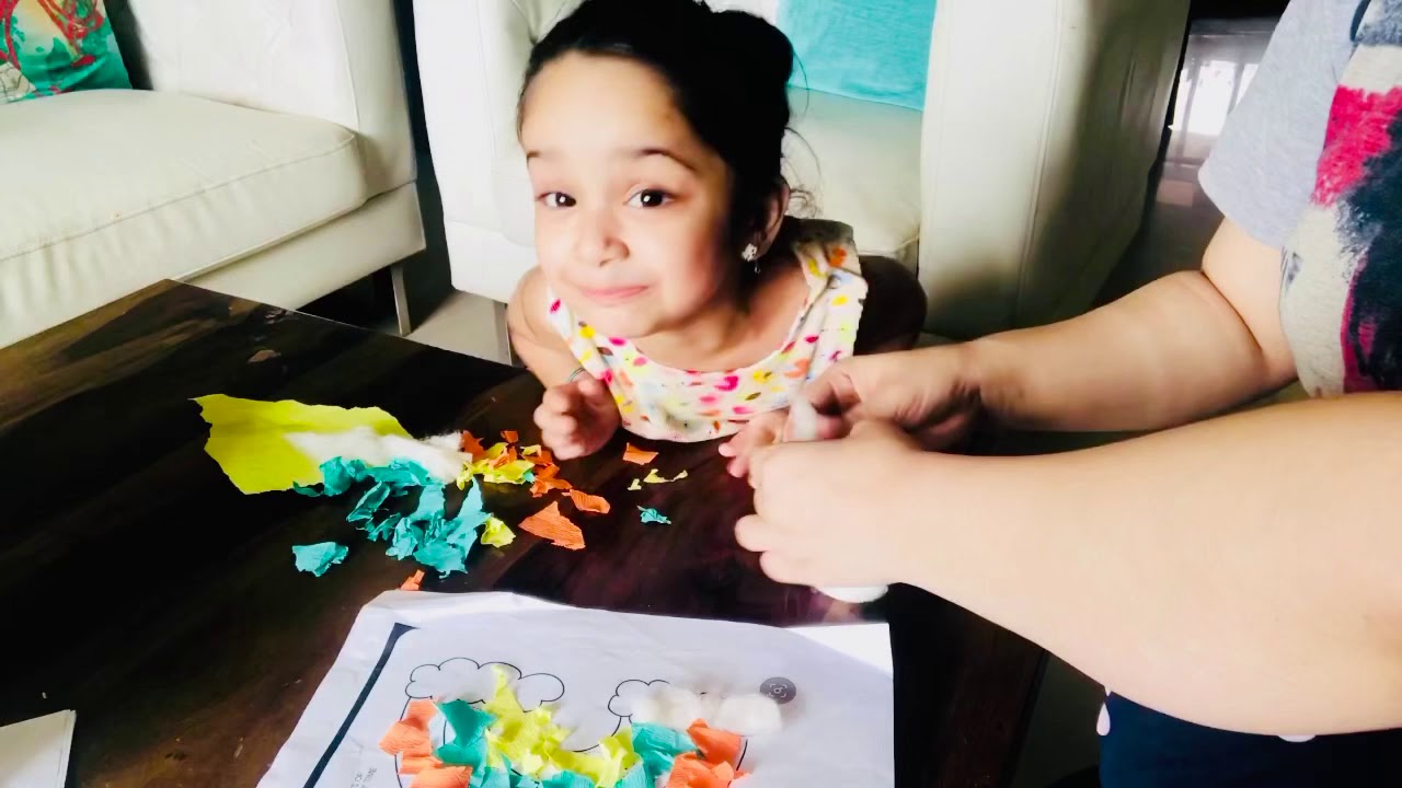 Cute baby doing paper tearing craft - YouTube