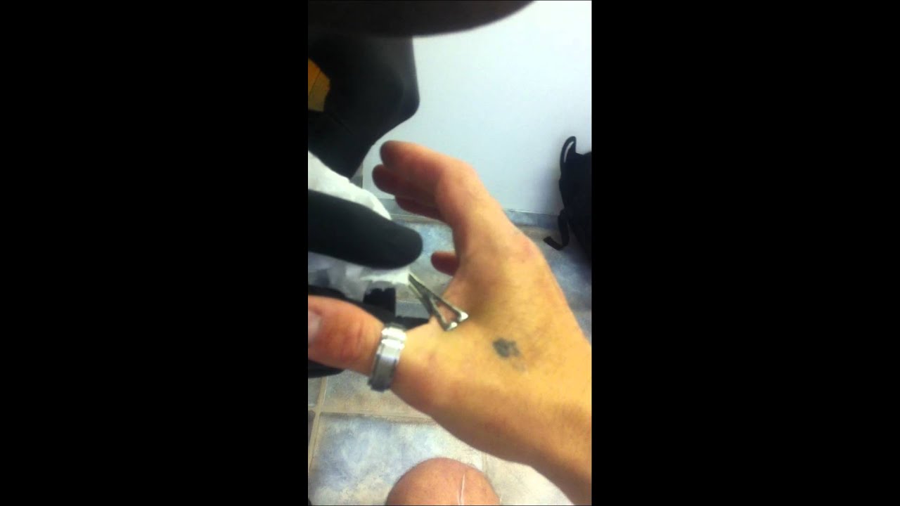 Piercing in hand hand - YouTube