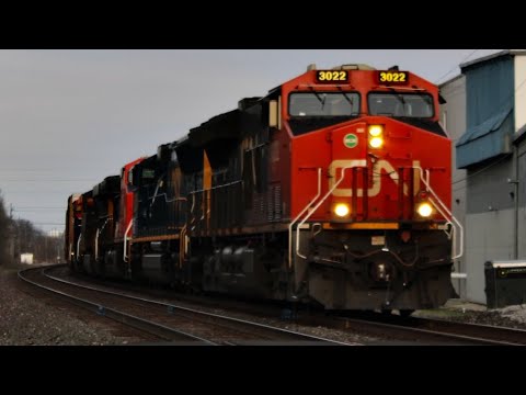 CN A443-61 passes Byrkit Avenue at MP 431 with fresh CSX rebuild and 2 fresh CN rebuilds ...
