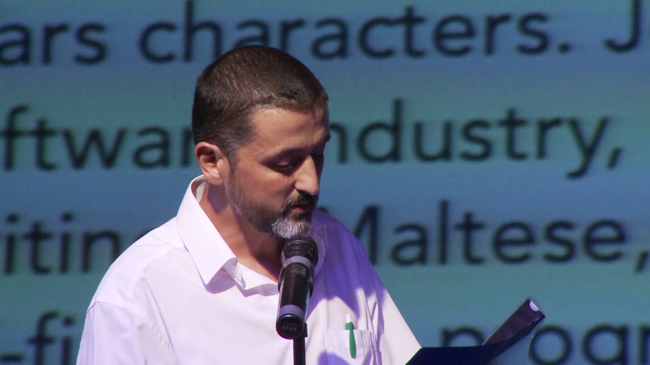 John A Bonello qed jaqra waqt il-Festival Mediterranju tal-Letteratura ...